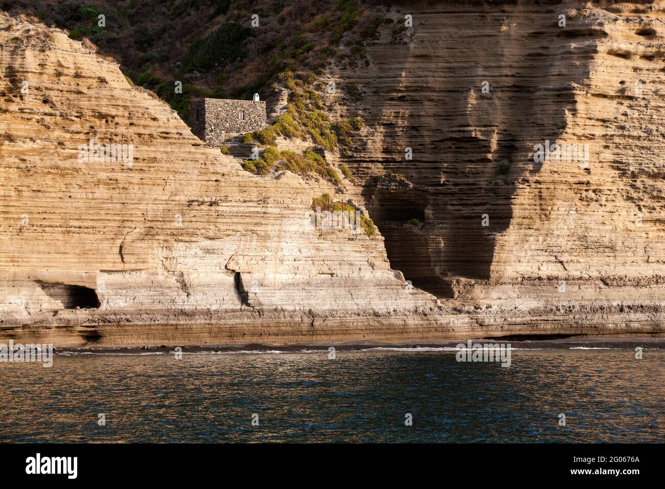 Pollara beach, tuff cliff, house, Salina island, Aeolian Islands ...