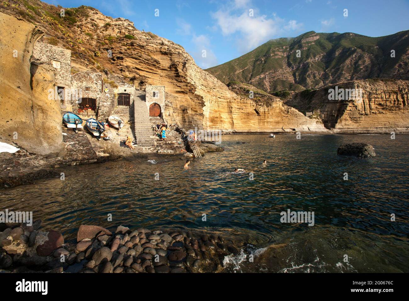 Pollara beach, tuff cliff, garaging fishing boats, Salina island ...