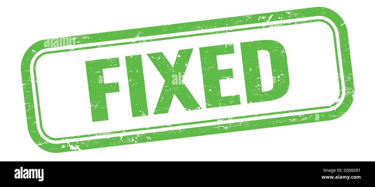 FIXED text on green grungy vintage rectangle stamp Stock Photo - Alamy