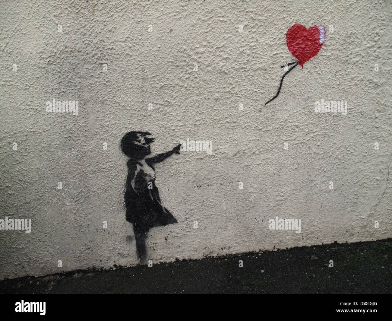 Banksy Girl with Red Balloon Stock Photo - Alamy