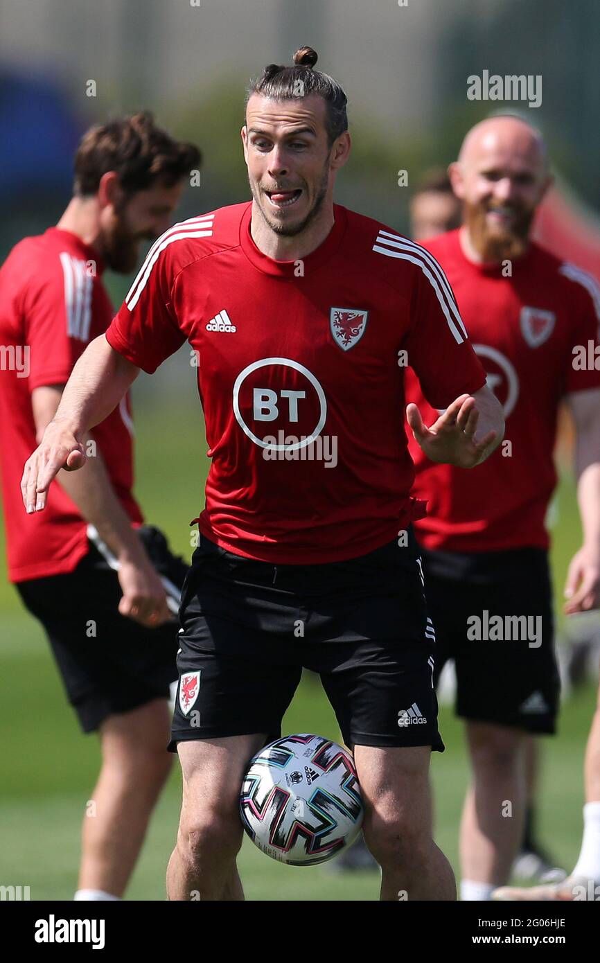 Cardiff, UK. 01st June, 2021. Gareth Bale of Wales jokes around with ball between his legs ...