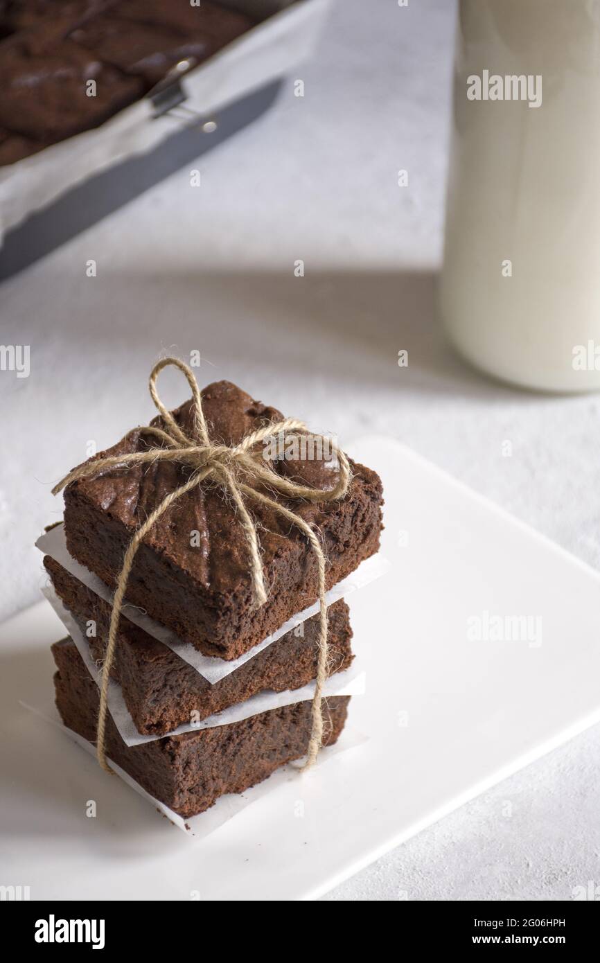 Stack of brownies wrapped Stock Photo - Alamy
