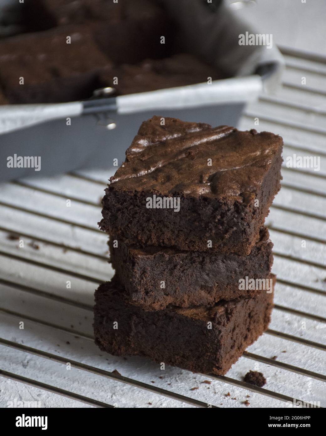 Stack of brownies cooling on rack Stock Photo - Alamy