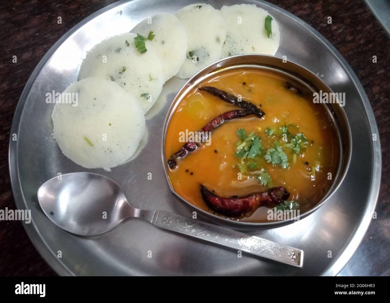 South Indian Famous Dish Idli Sambar Stock Photo - Alamy