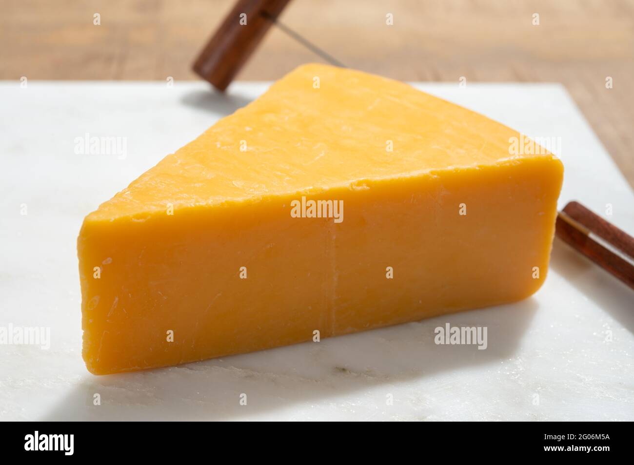 Cheese collection, piece of matured British yellow cheddar cheese made ...
