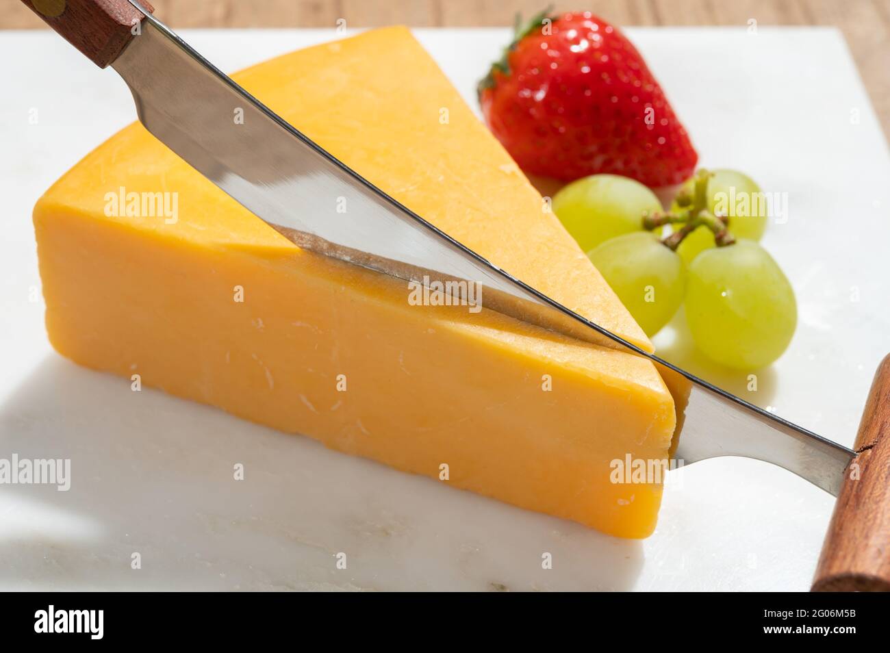 Cheese collection, piece of matured British yellow cheddar cheese made ...