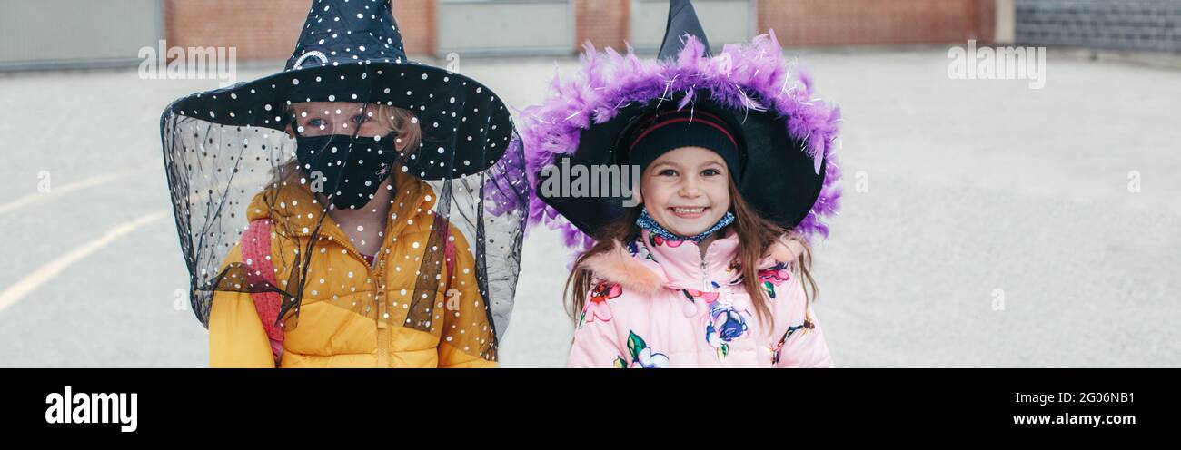 Happy Halloween. Children girls friends in witch costumes and face ...