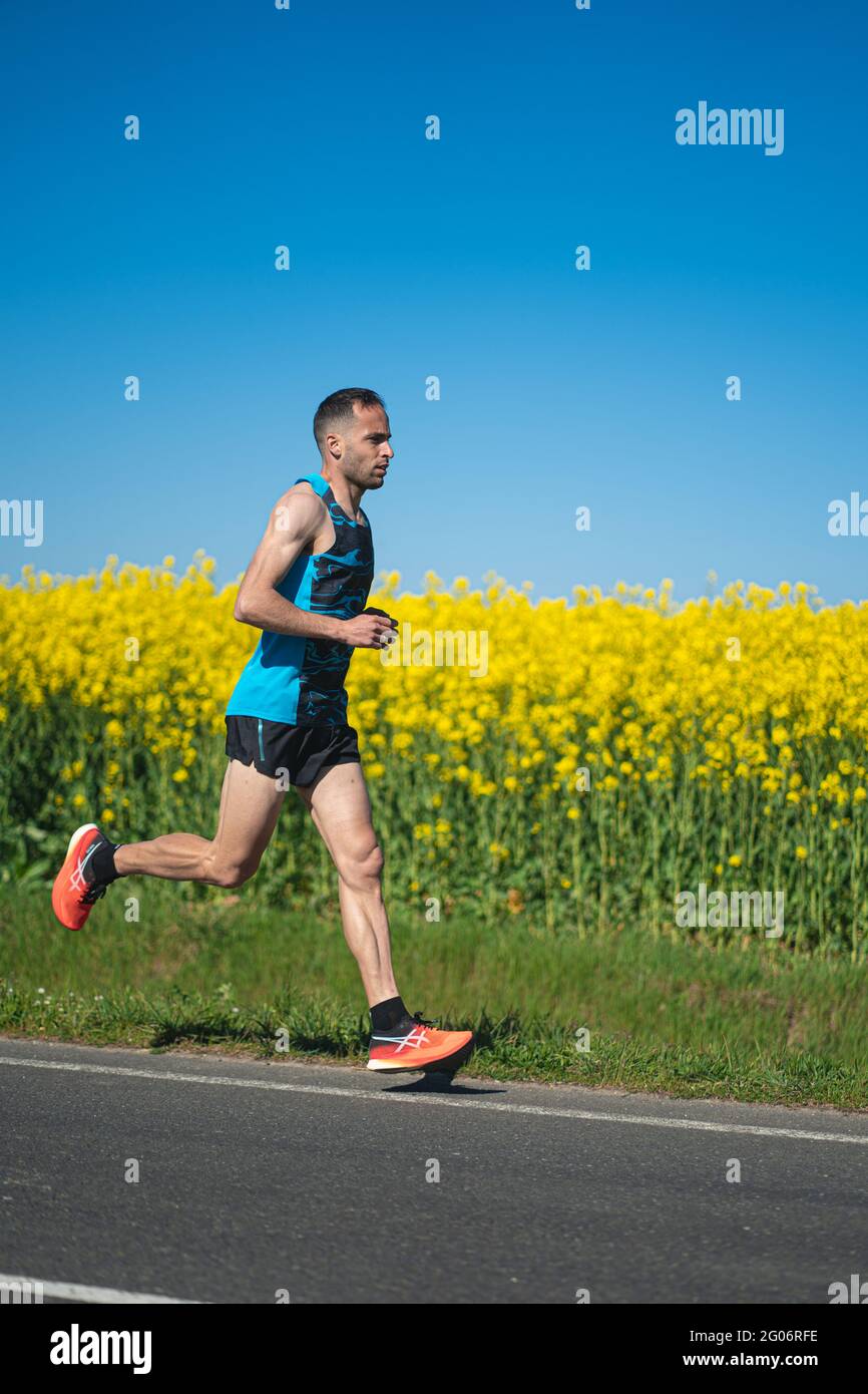 Runner running through his city, healthy and healthy lifestyle Stock ...