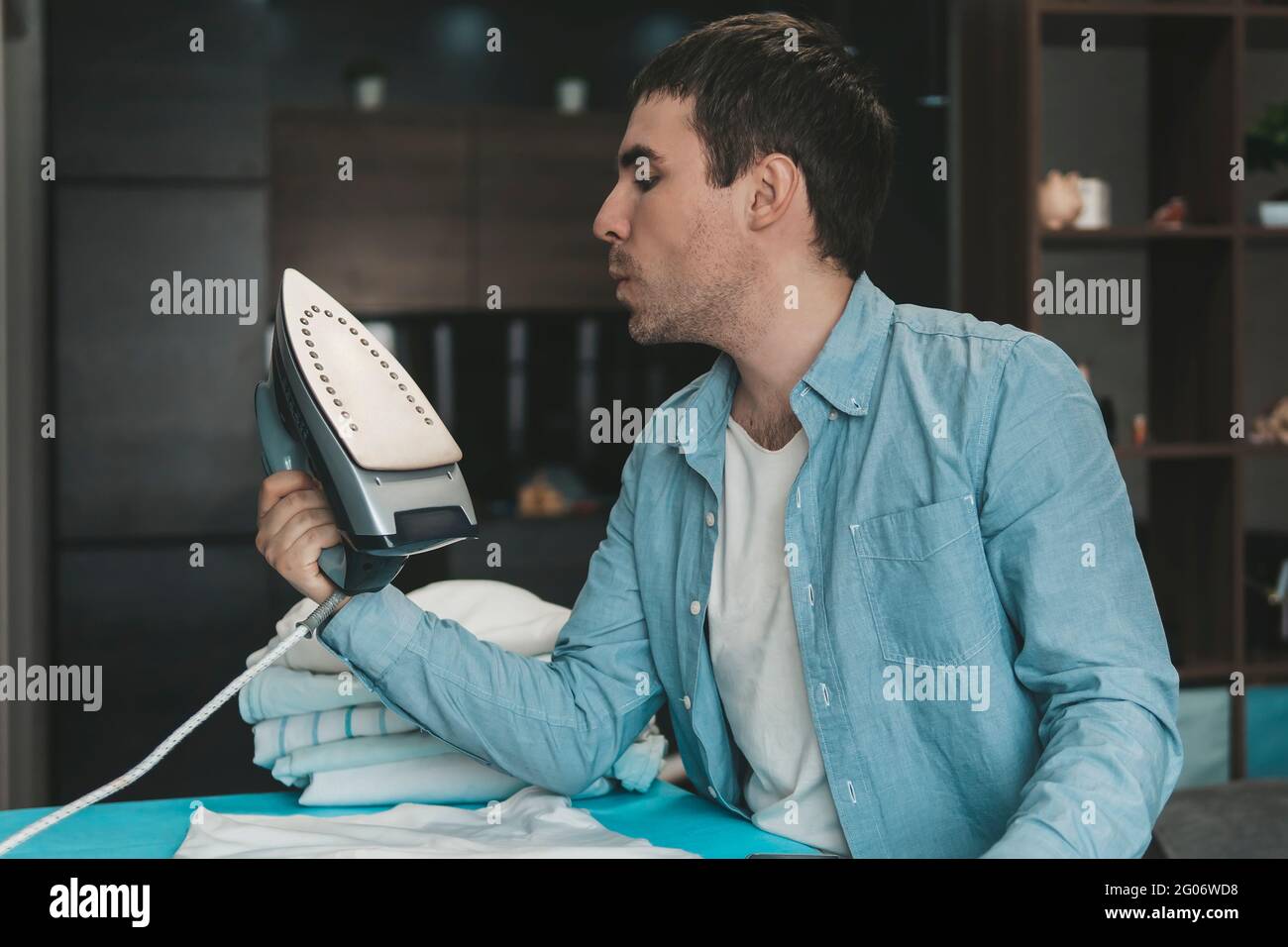 Man washing clothes by hand hi-res stock photography and images - Alamy