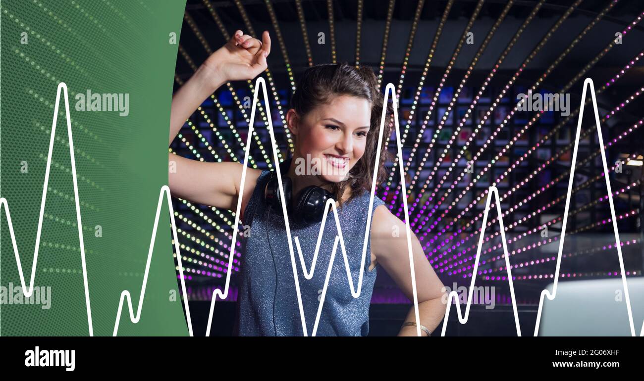 Composition of green curve and white sound peak meter over smiling ...