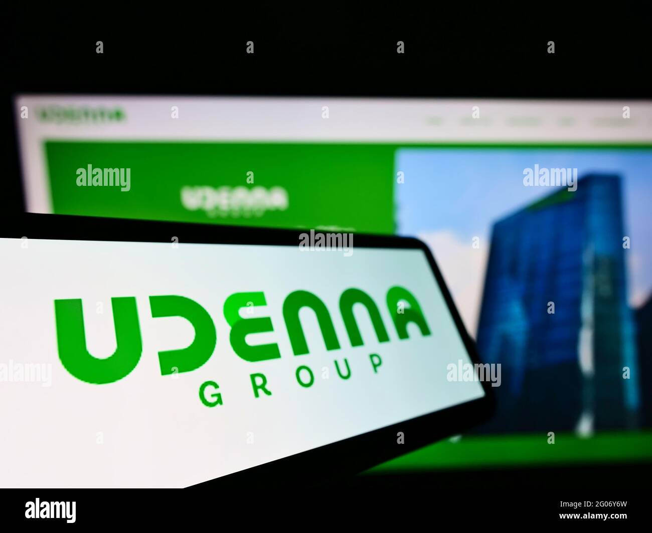 Cellphone with logo of Filipino conglomerate Udenna Corporation on ...