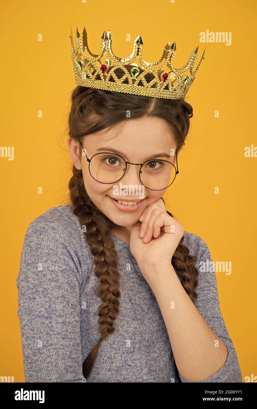 Adorable girl in glasses. Happy smiling princess. Excellent pupil ...