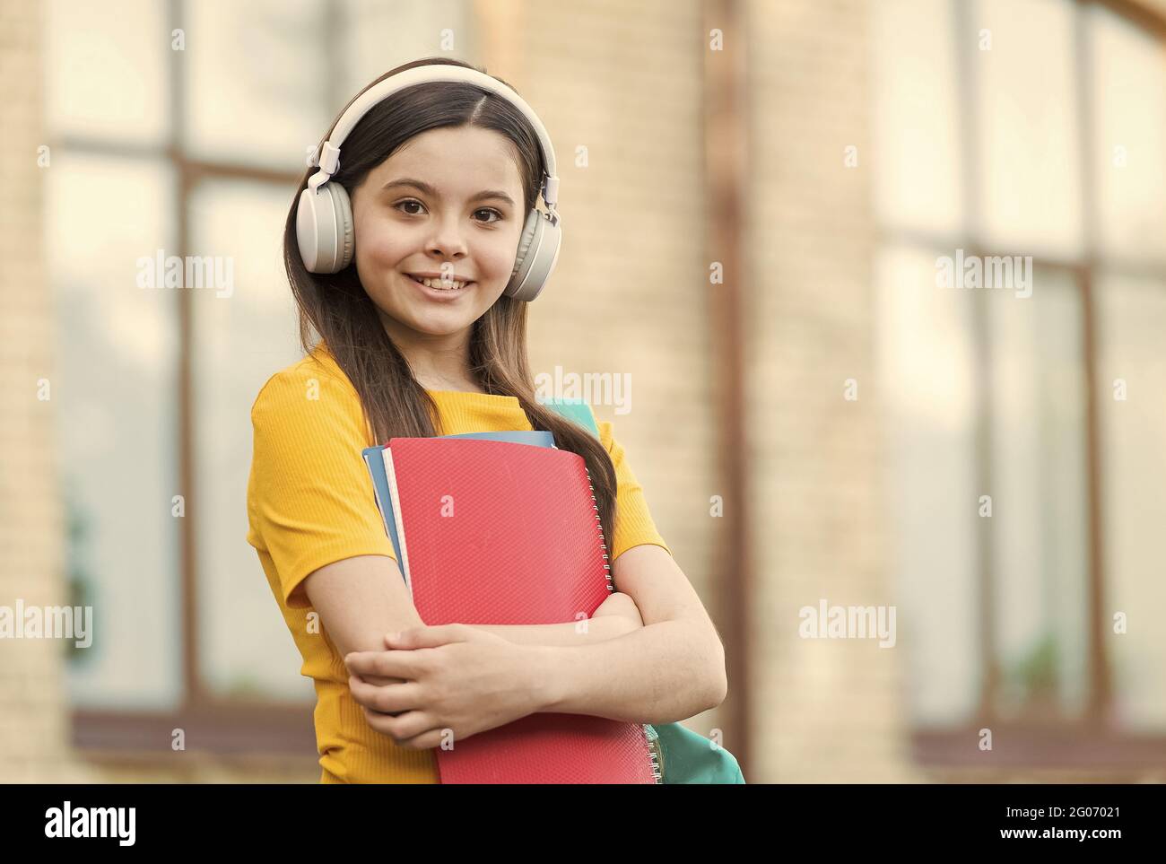 Learning foreign language. Small girl learn English. Little child hold ...