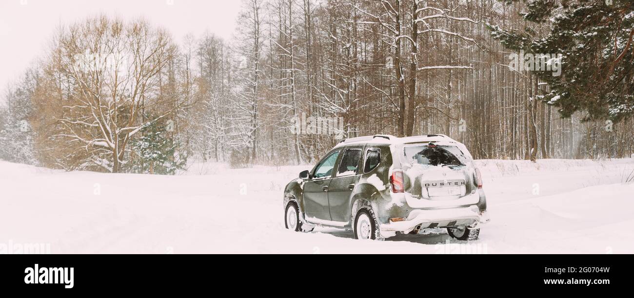 Renault Duster Or Dacia Duster Suv Parked In Snowdrift. Winter Snowy ...