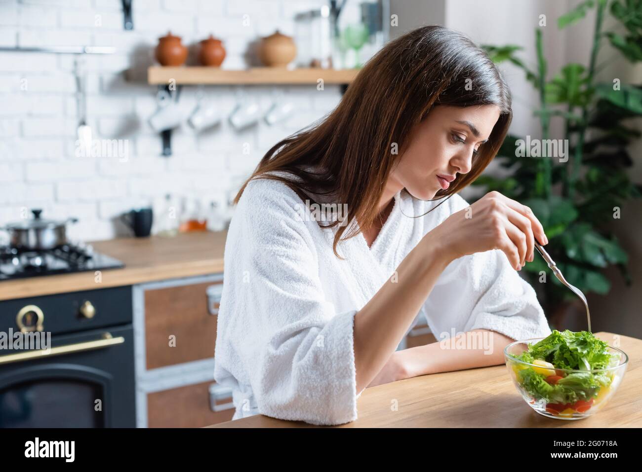 Sad eating salad hi-res stock photography and images - Alamy