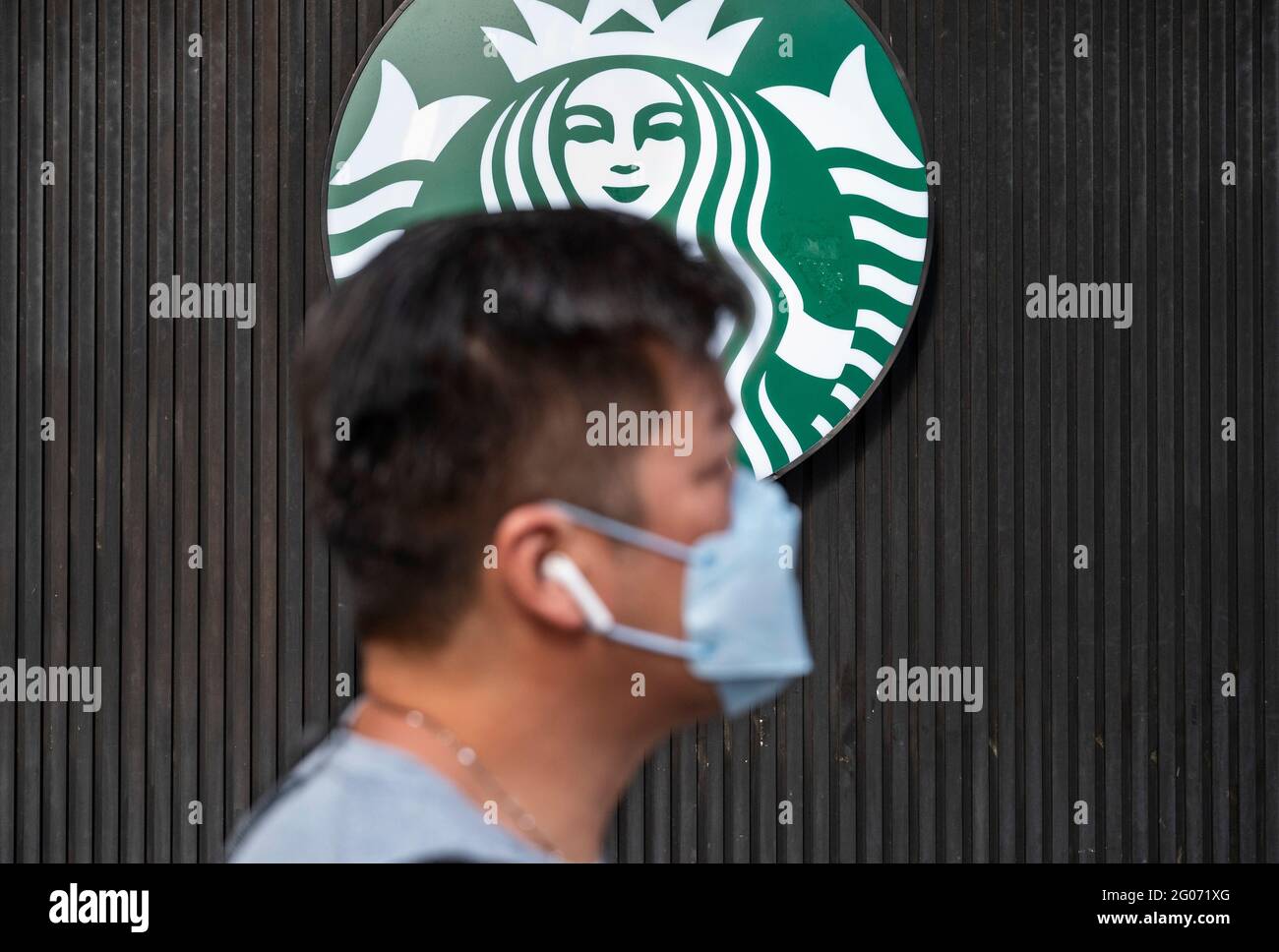 Hong Kong, Hong Kong. 01st June, 2021. A pedestrian wearing a face mask ...