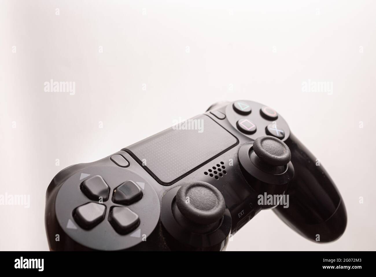Closeup shot of a black joystick on white background Stock Photo - Alamy