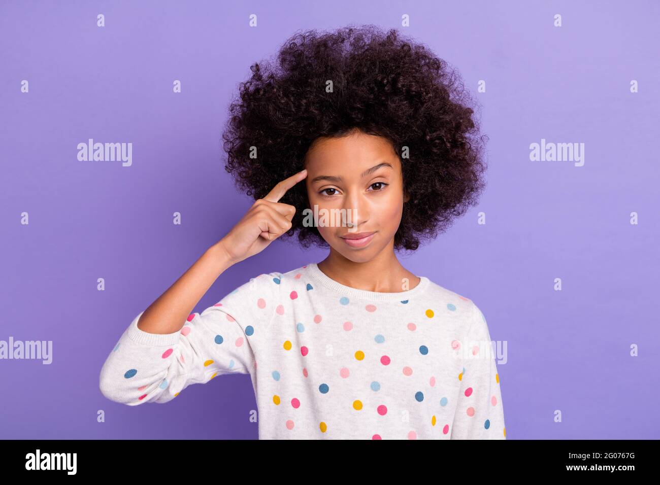 Photo of thoughtful serious afro american girl point finger head idea ...