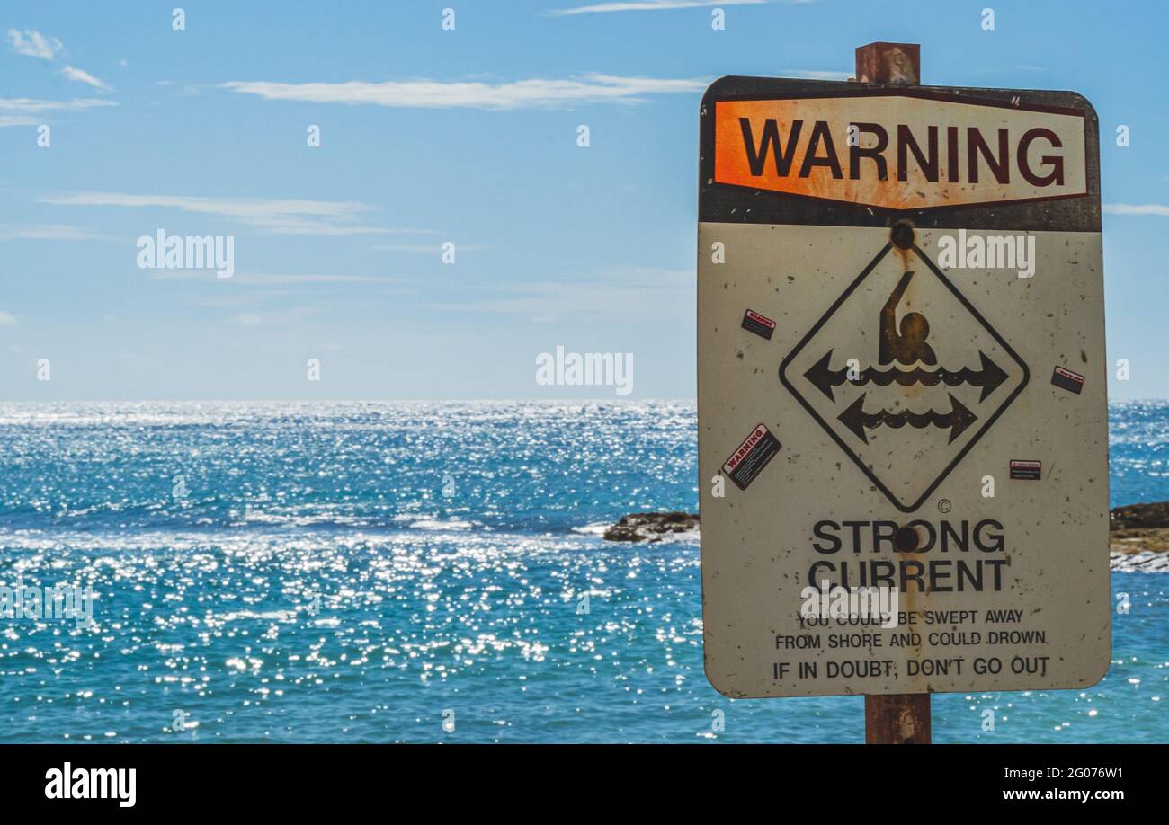 Strong currents warning sign at tropical Hawaiian beach danger of rip ...
