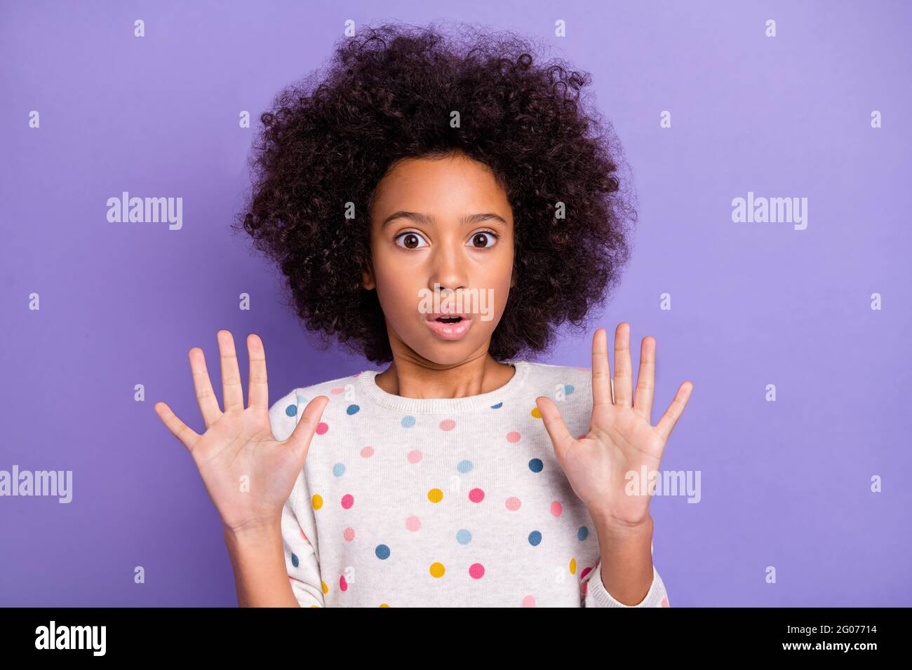 Photo of scared shocked afro american small girl raise hands horrified ...
