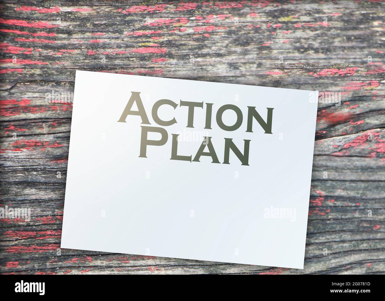 Action plan words, paper signs of dollar on wooden table. Business ...