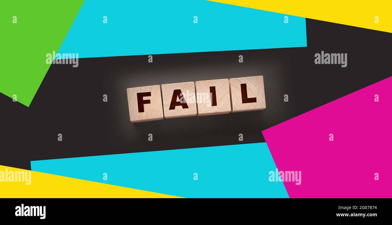 FAIL Word text Written In Wooden Cube blocks on black background ...