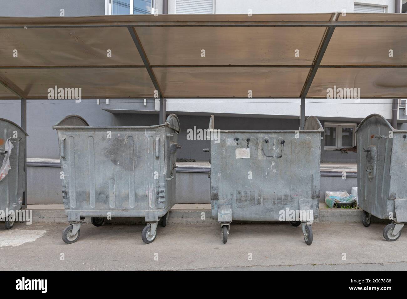 Wheeled Dumpster Metal Containers Under Cover Stock Photo - Alamy