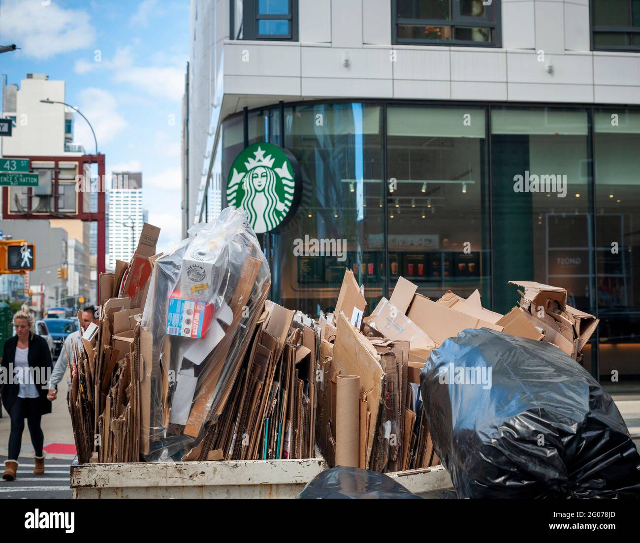 Cardboard boxes waiting for trash pick-up outside of a building in New ...