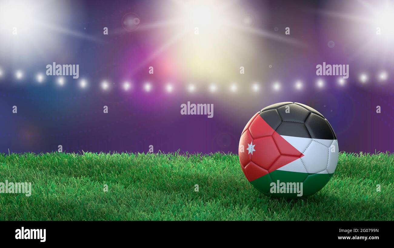 Soccer ball in flag colors on a bright blurred stadium background ...