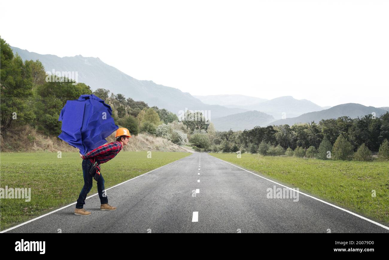 Engineer man carry load Stock Photo - Alamy