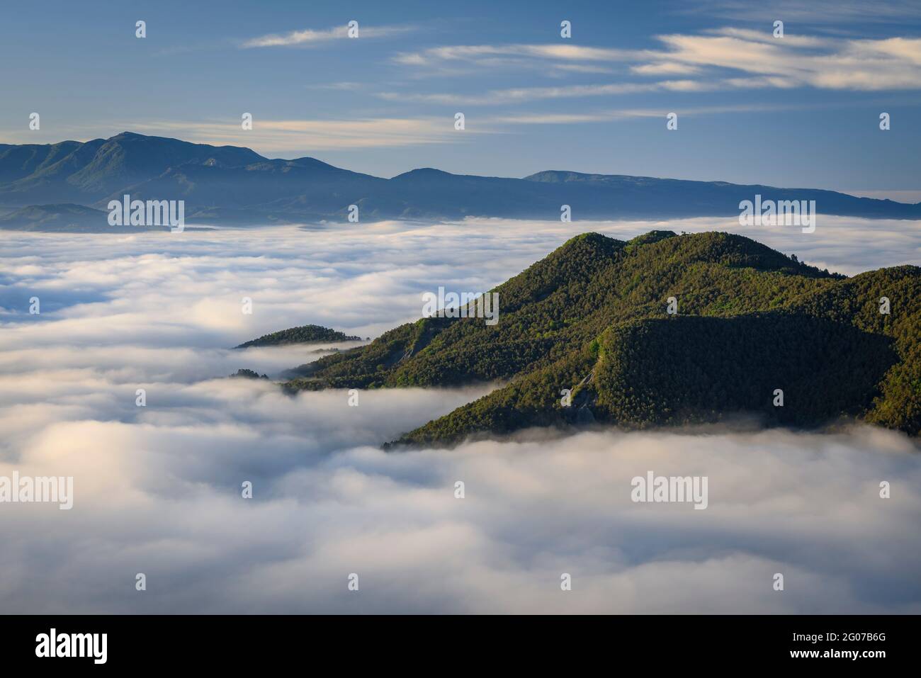Foggy spring sunrise in Plana de Vic, seen from Sant Bartomeu del Grau ...