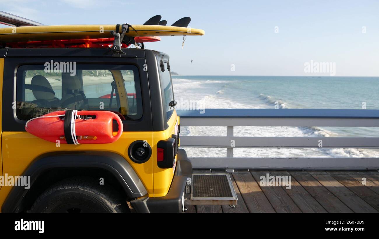 Yellow lifeguard car, San Clemente beach pier, California USA ...
