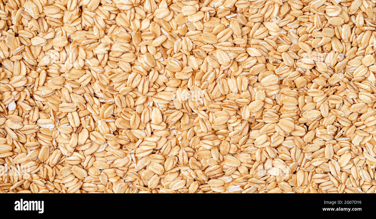 Raw oats background. Healthy food, top view overhead Stock Photo - Alamy