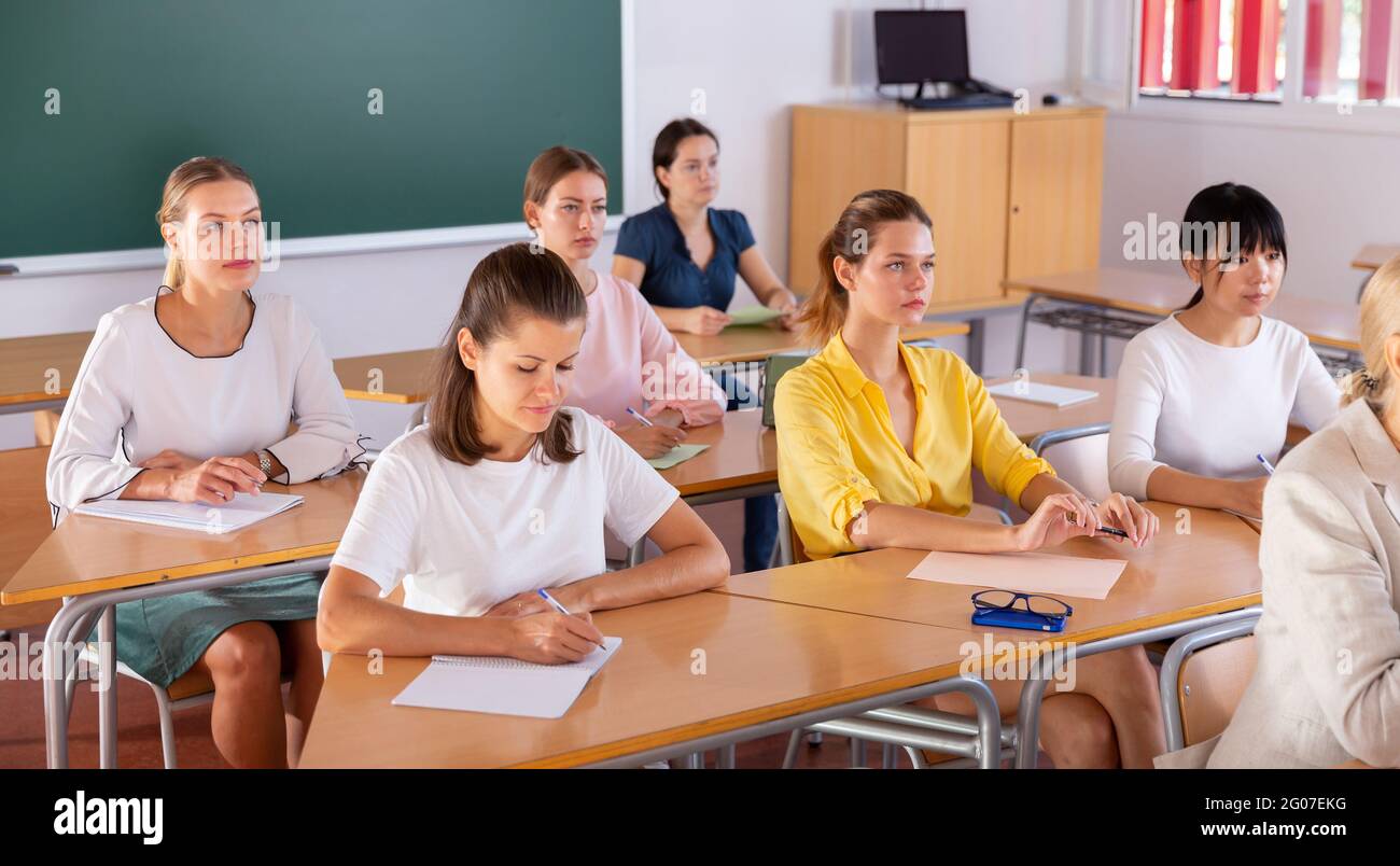 Friendly students writing test hi-res stock photography and images - Alamy