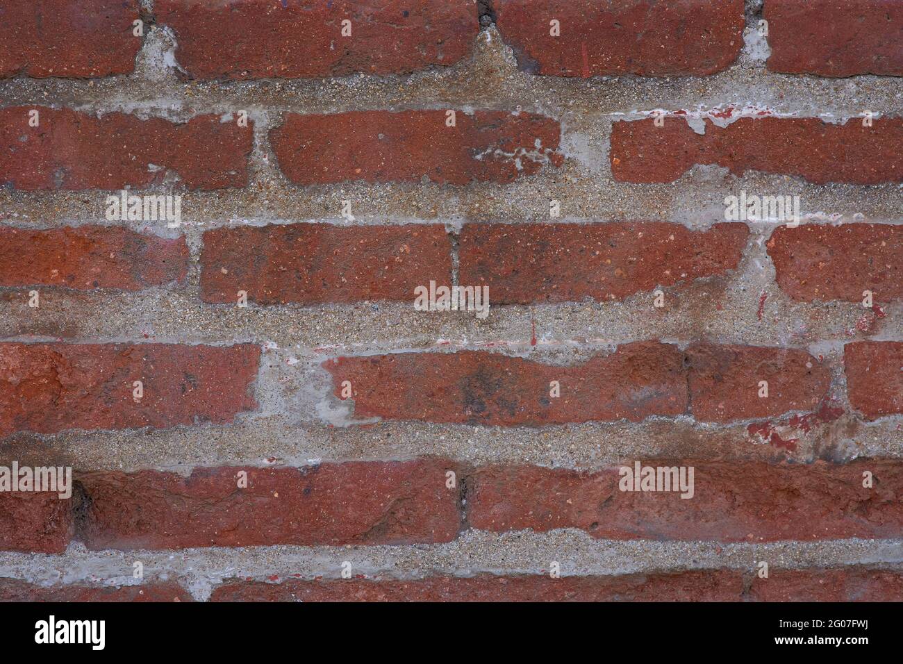 Texture of a weathered red brick wall Stock Photo - Alamy