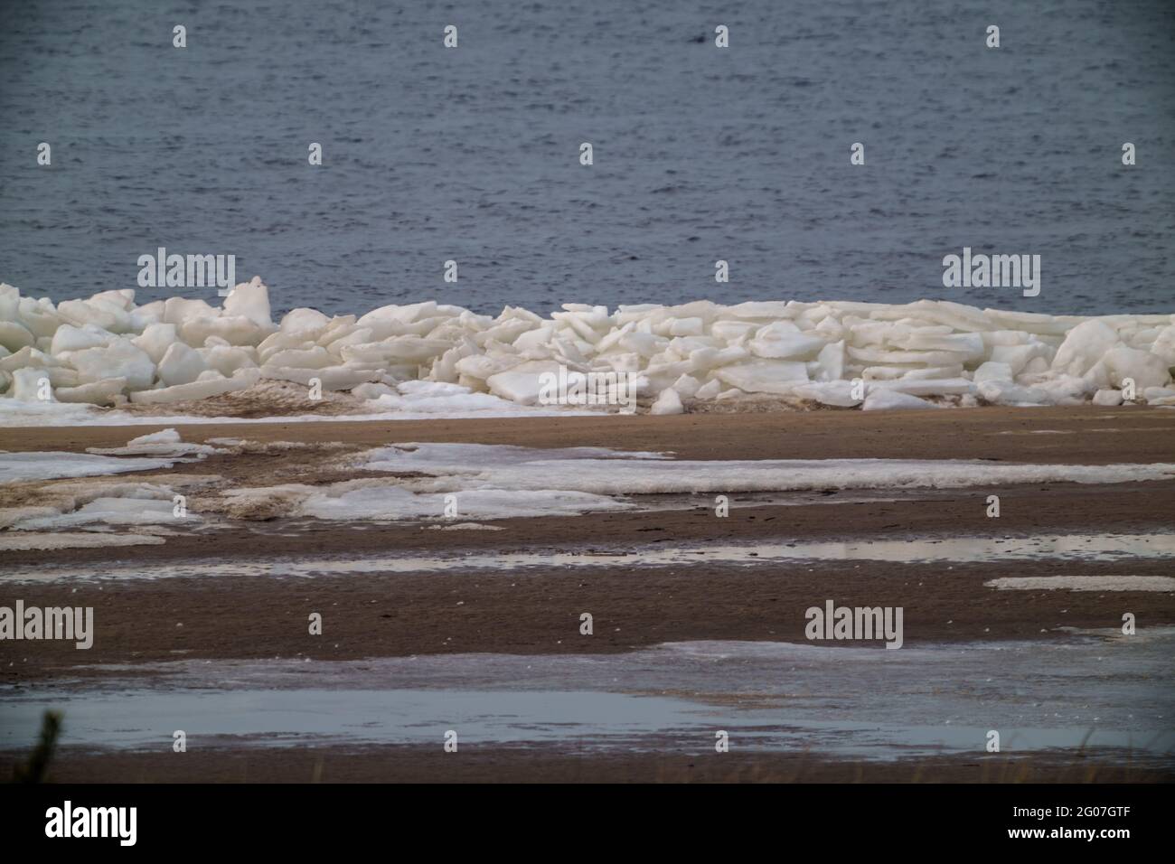 ice block covered river in winter with sandstone cliffs Stock Photo - Alamy
