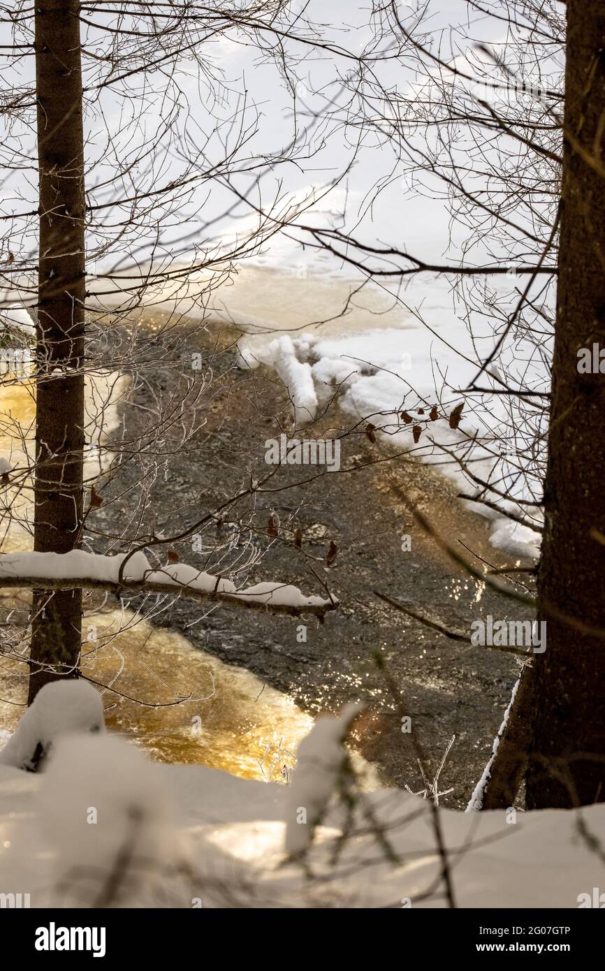 ice block covered river in winter with sandstone cliffs Stock Photo - Alamy
