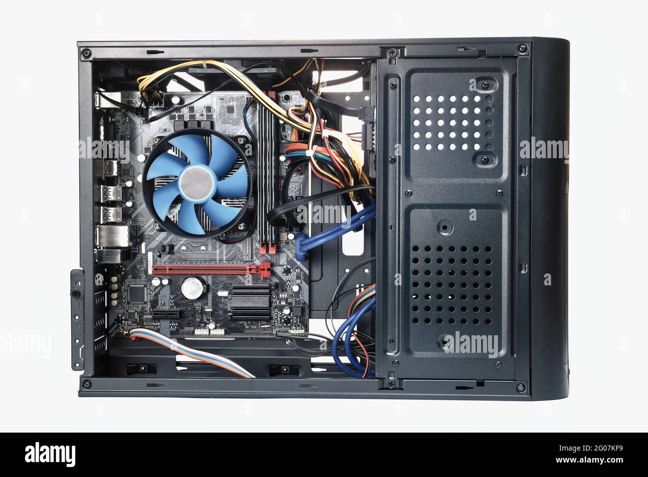 Black open desktop computer side view with motherboard visible. PC ...