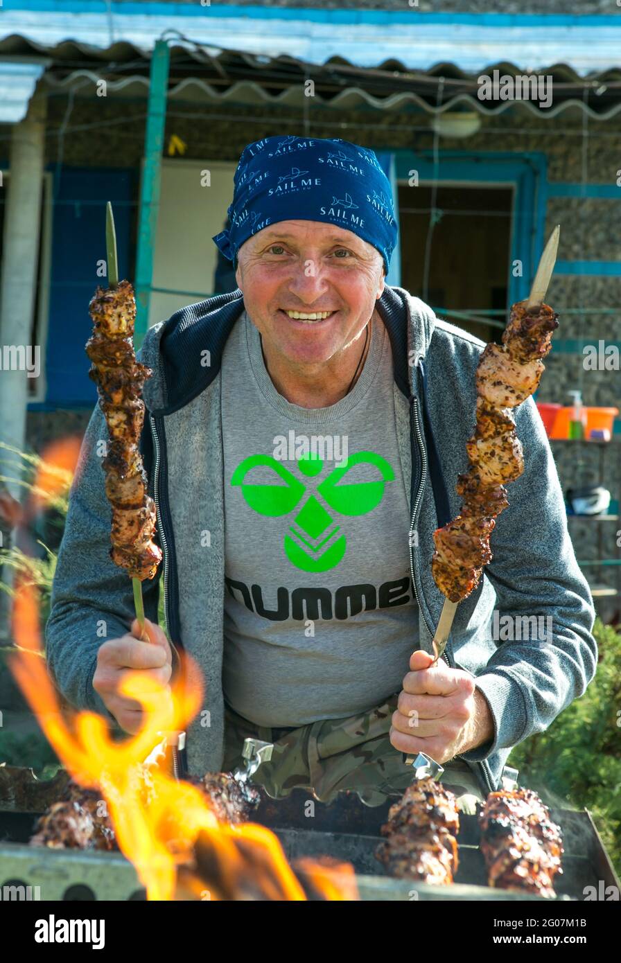 Fat man garden hi-res stock photography and images - Alamy