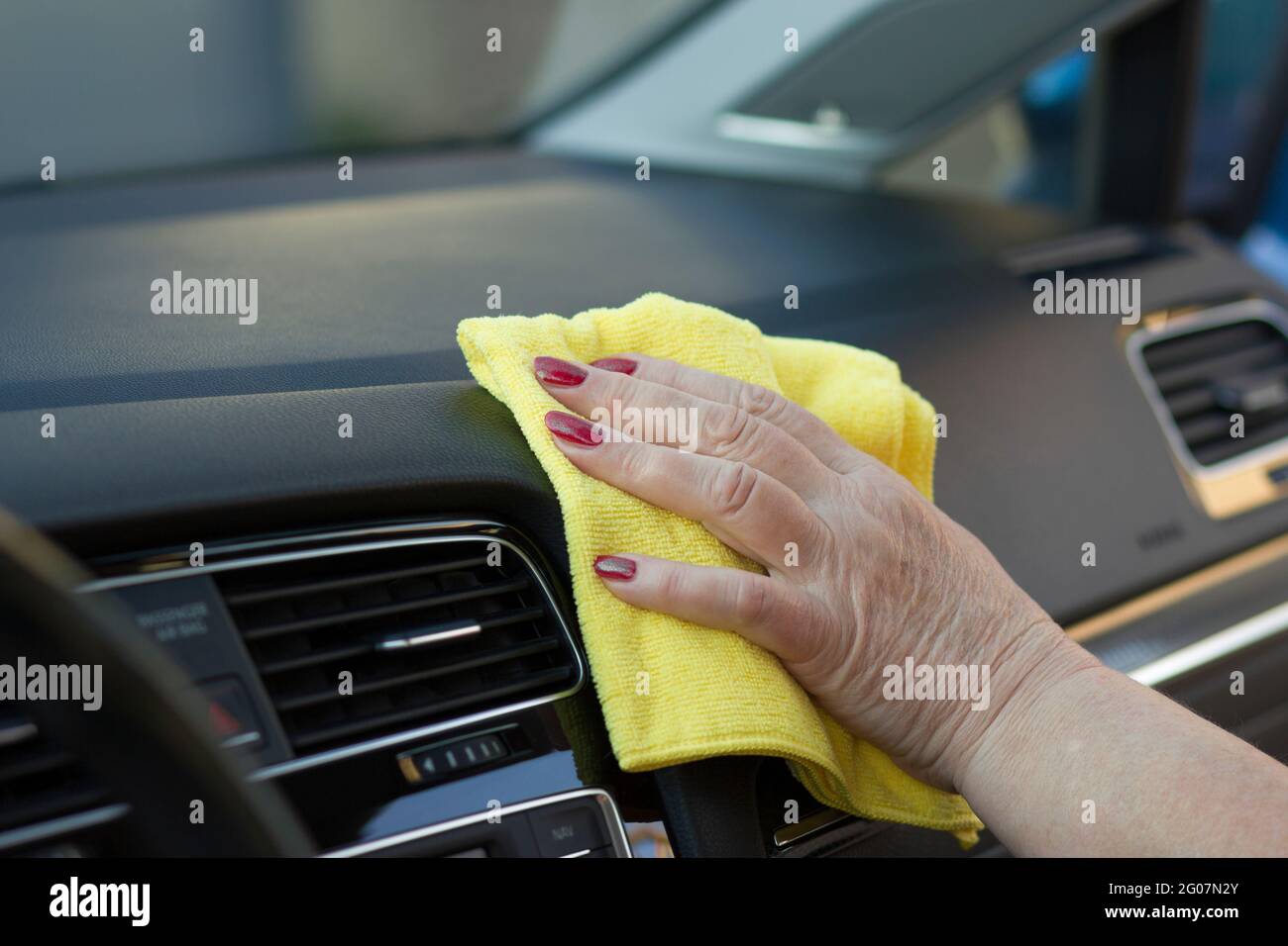 Woman cleaning car dashboard hi-res stock photography and images - Alamy