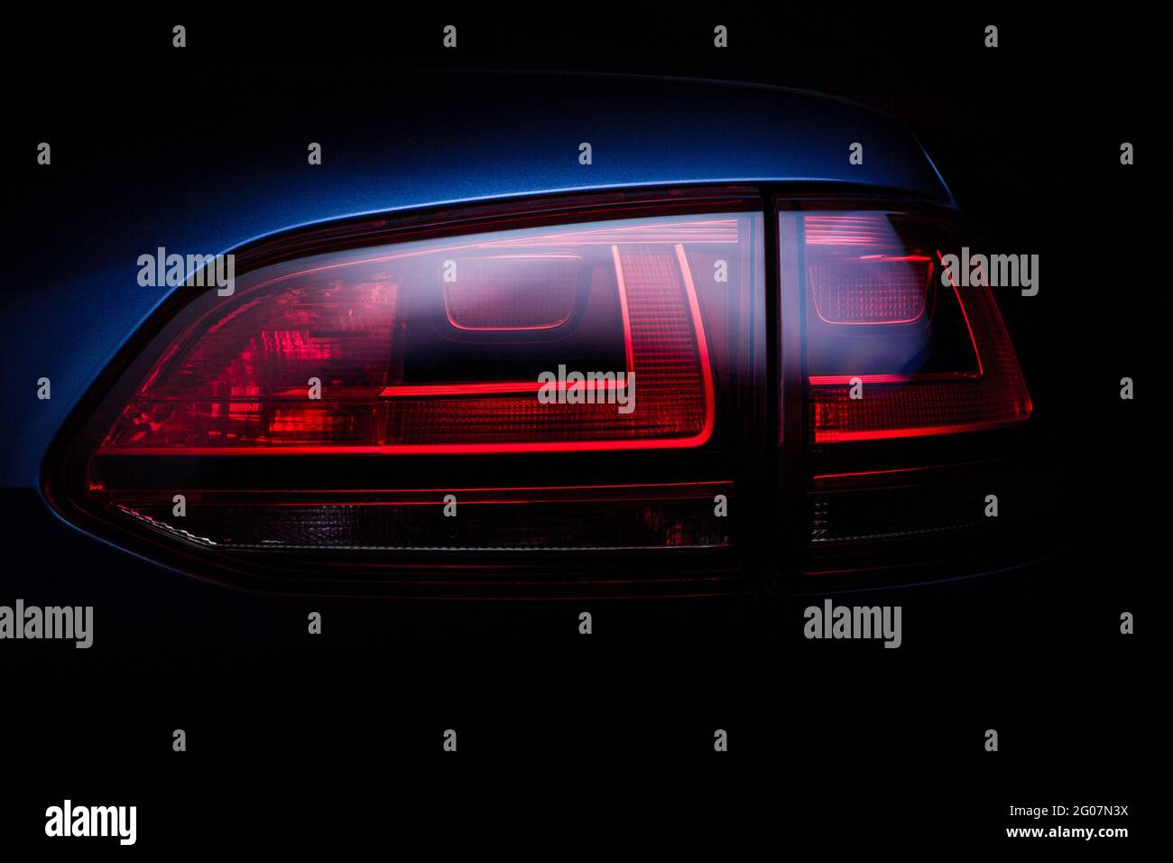 Macro photo of blue car tail light or stop light Stock Photo - Alamy