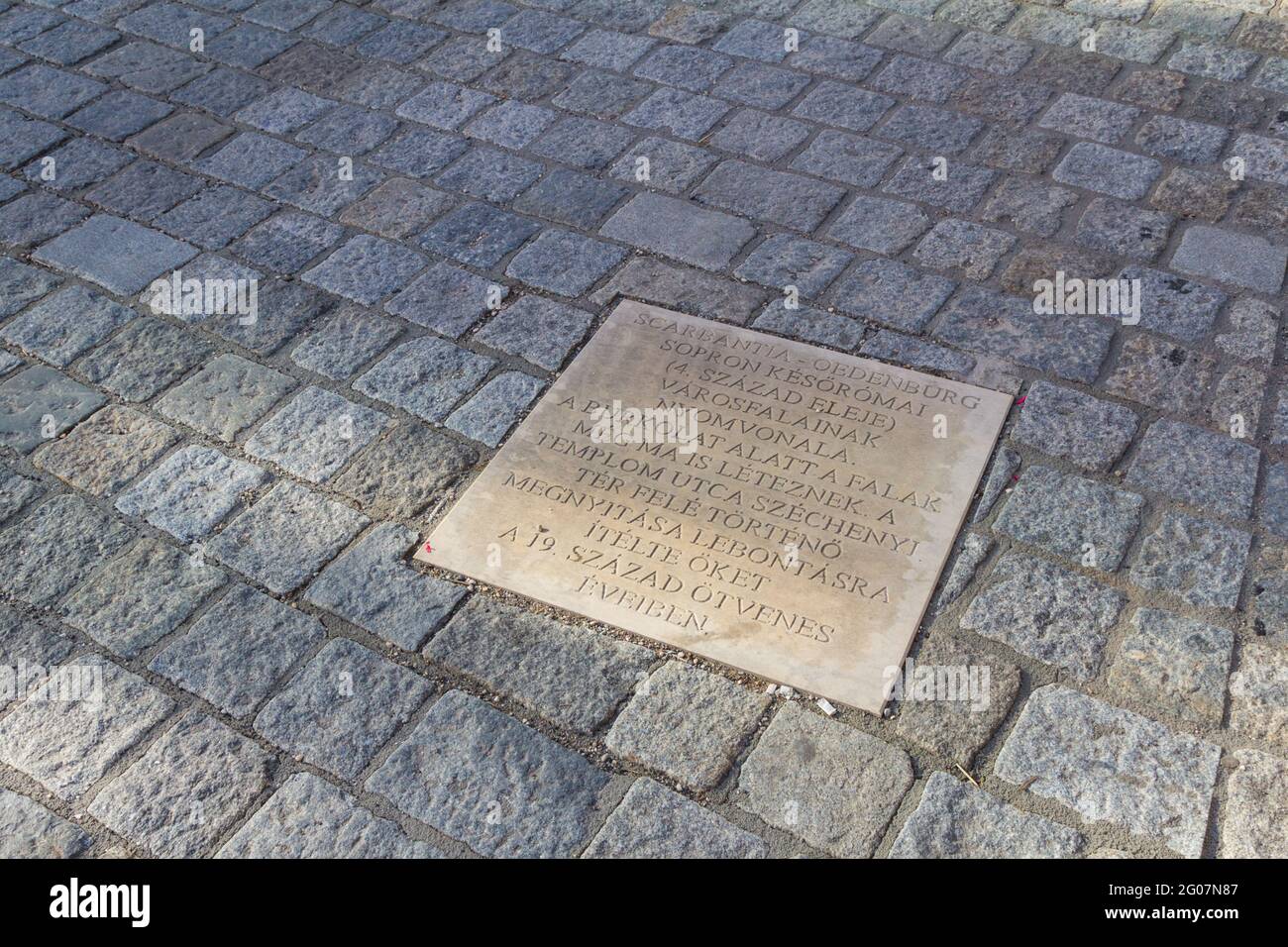 Stone plaque showing the place of the ancient Roman town wall ...