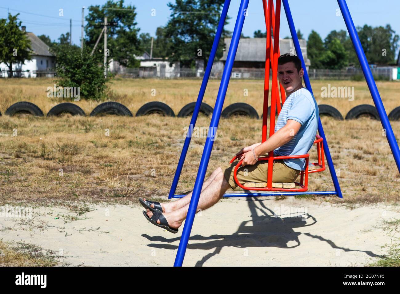 Man swing with kids hi-res stock photography and images - Alamy