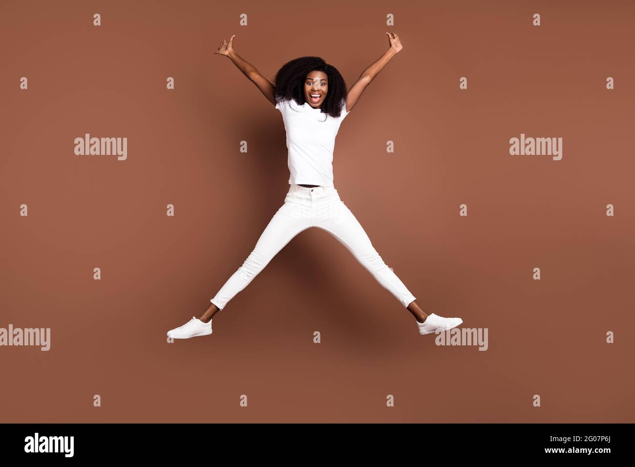 Full length body size view of attractive cheerful crazy girl jumping ...