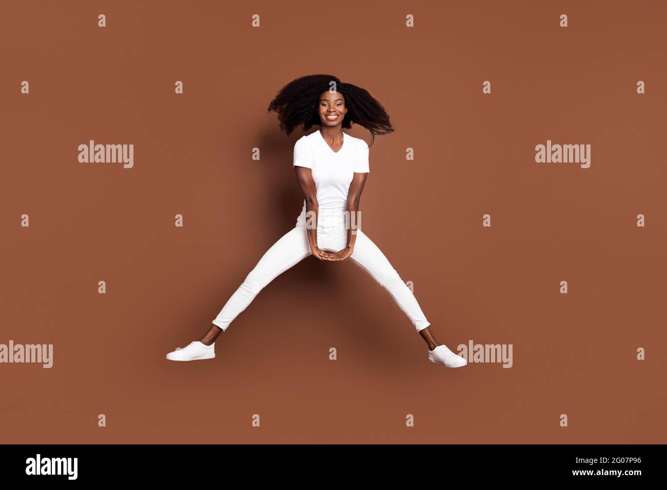 Full length body size photo of cool funky model jumping up careless ...