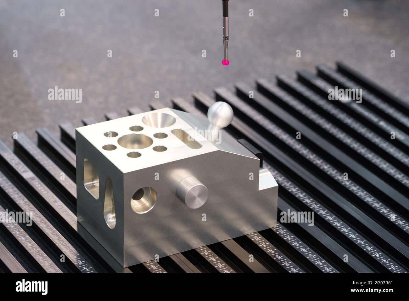 Operator inspection dimension metal parts by CMM after machining ...