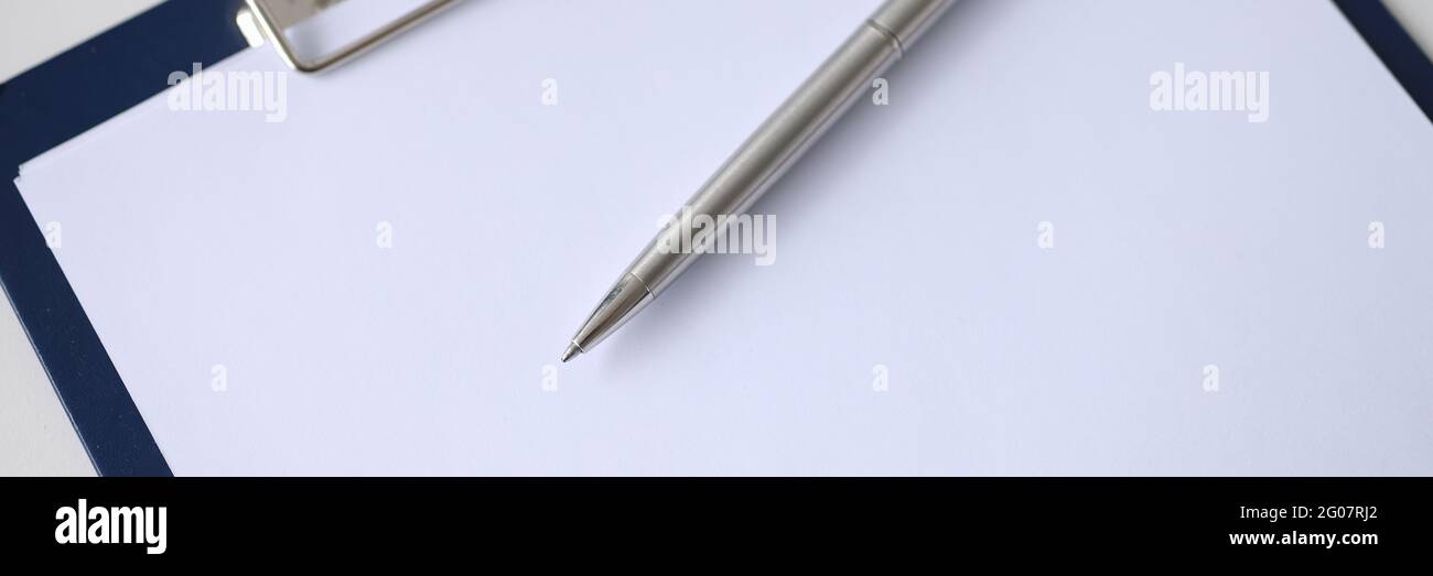 Ballpoint pen lying on clipboard with blank document closeup Stock ...