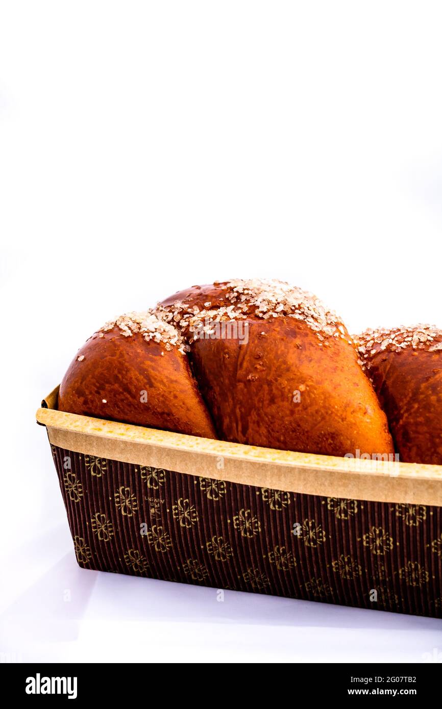 Vertical shot of a Cozonac sweet bread isolated on a white background ...