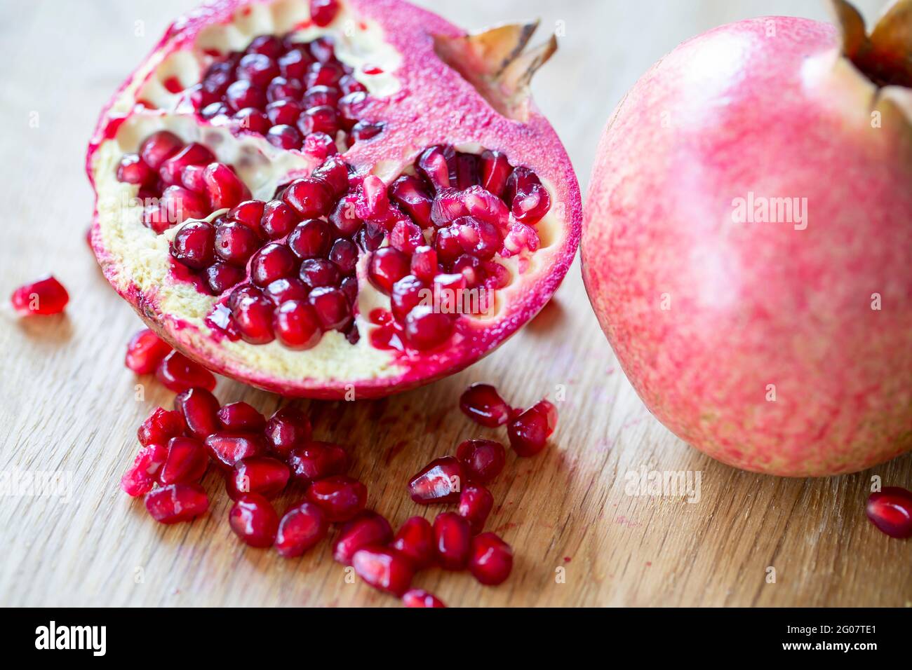 Cracked ripe pomegranate fruit on hi-res stock photography and images ...