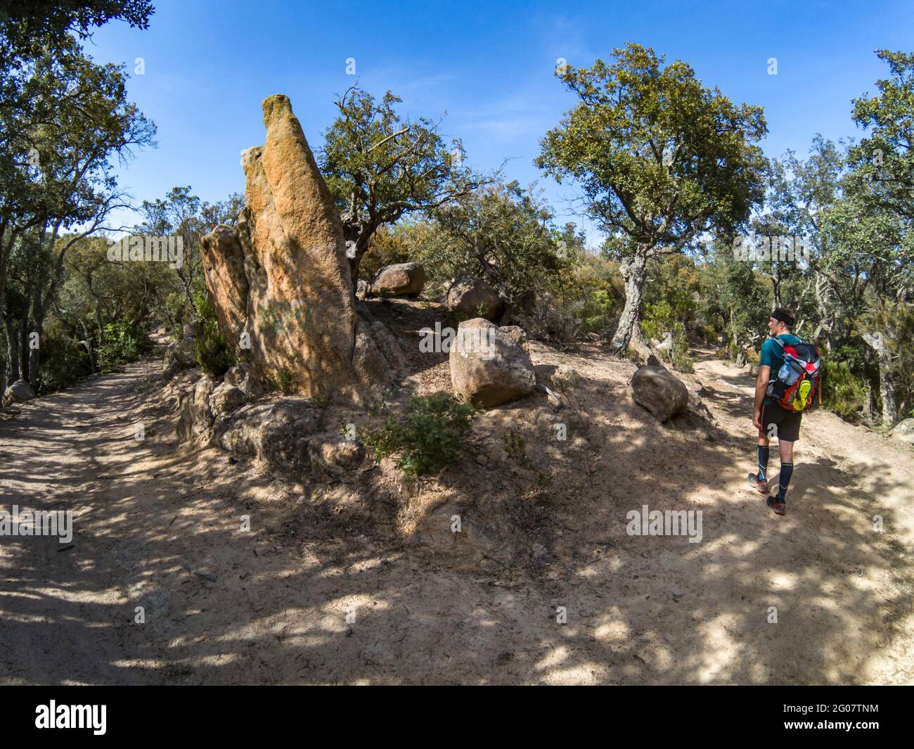 Man hiking along the Spanish Costa Brava coastal path (GR92 Cami de ...
